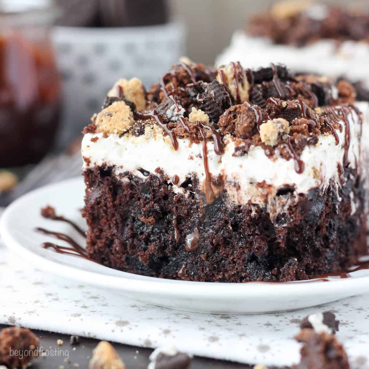 Decadent Slutty Brookie Poke Cake l Beyond Frosting
