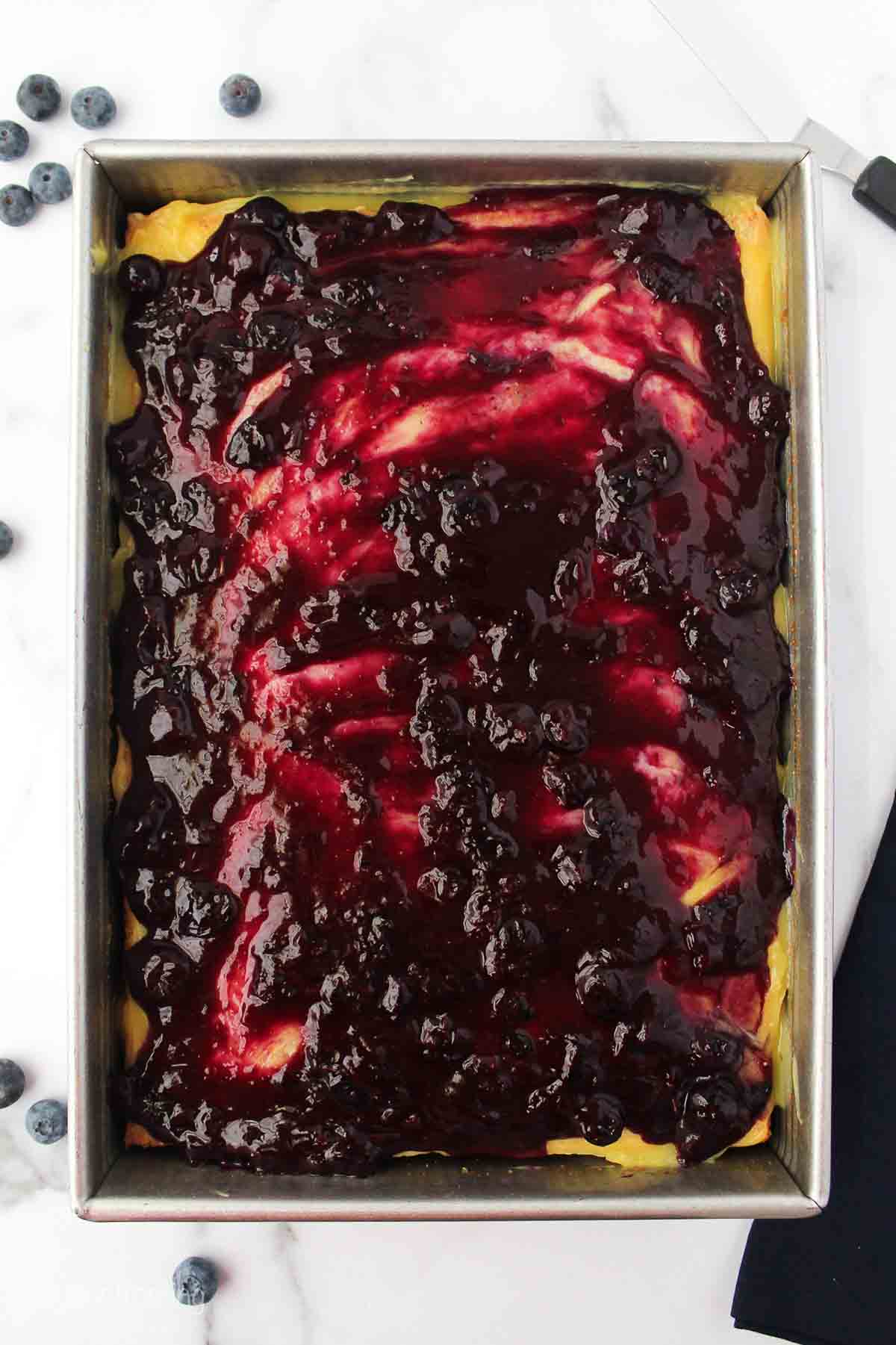 Blueberry Cheesecake Poke Cake | Beyond Frosting
