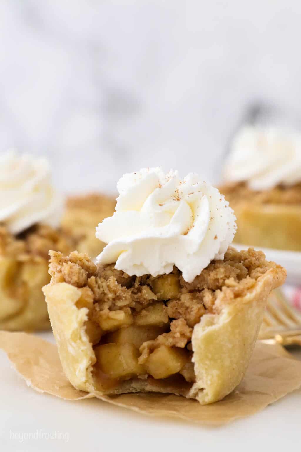 Mini Apple Pies (Baked in a Muffin pan) | Beyond Frosting