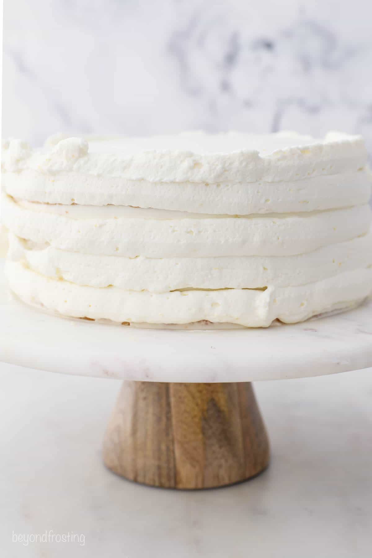 Lemon Layer Cake with Mascarpone Whipped Cream l Beyond Frosting