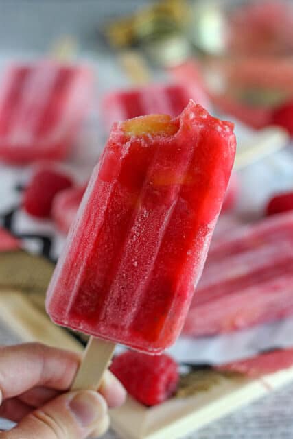 Easy Raspberry Peach Champagne Popsicles | Beyond Frosting