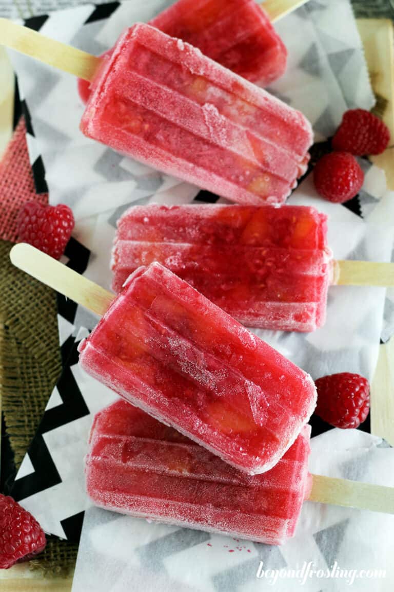 Easy Raspberry Peach Champagne Popsicles | Beyond Frosting